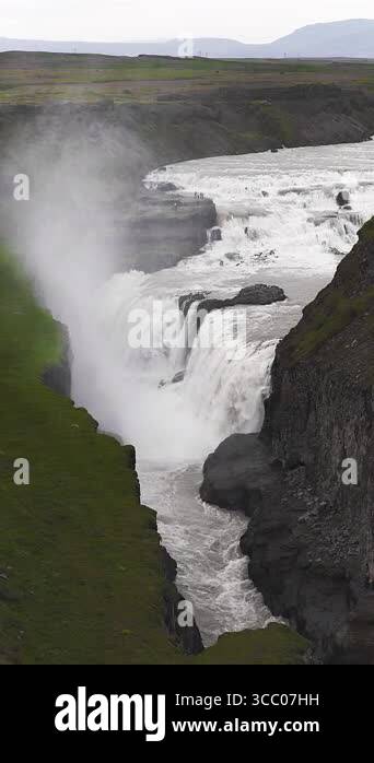 Aerial view of Gullfoss waterfall in Iceland, cascading in two tiers ...