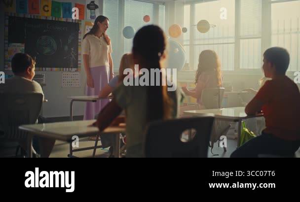 Female Teacher Finishing the Lesson, Announcing the End of School Day ...
