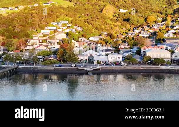 Drone footage captures Akaroa's scenic waterfront and hillside homes ...
