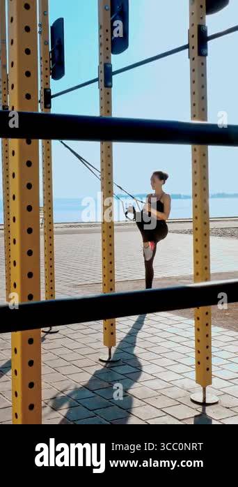 Workout outdoors. suspension straps. workout with straps. Athletic ...