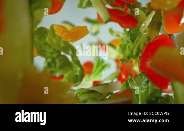 Super Slow Motion Shot of Falling Fresh Salad at 1000fps. Filmed with ...