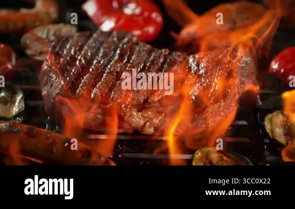 Super Slow Motion Shot of Beef Steak Meat on Hot Grill with Camera ...