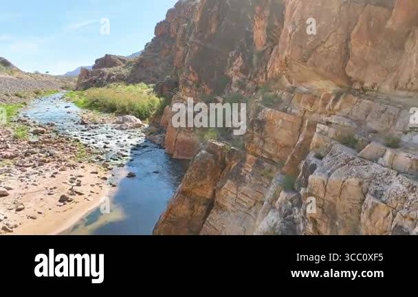 Aerial fly through of the Virgin River Gorge near Littlefield Arizona ...