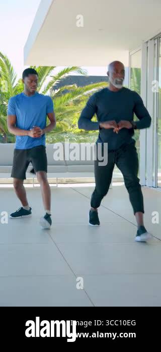 Vertical video: African American trainer training trainee marching ...