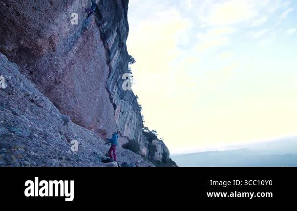 Female friends going climbing on the real rock. High quality 4k footage ...