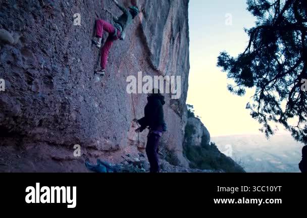 Female friends going climbing on the real rock. High quality 4k footage ...