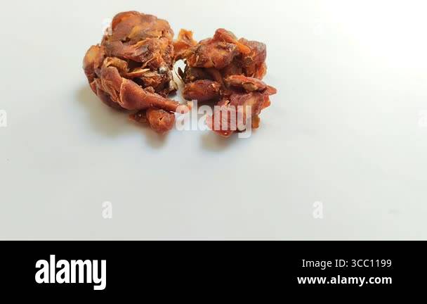 Javanese tamarind that is ripe and has been peeled of the skin and ...