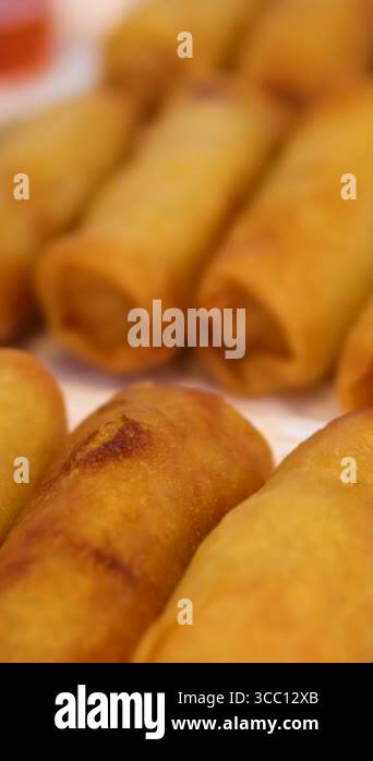 rice paper rolls Tourists prepare and eat spring roll with rice paper ...