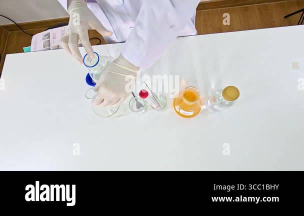 Scientist conducts a bromothymol blue experiment, showcasing color ...