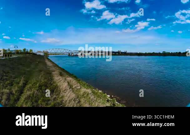 Time lapse view of railway bridge spanning Vistula in Poland. Shifting ...