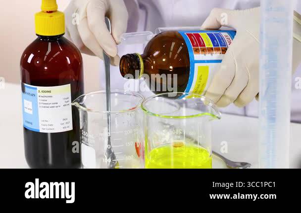 Chemical reaction demonstration with iodine and solutions Stock Video ...