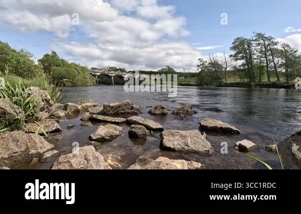 Wooden trestle bridge over River Spey near Nethy Bridge, featuring ...
