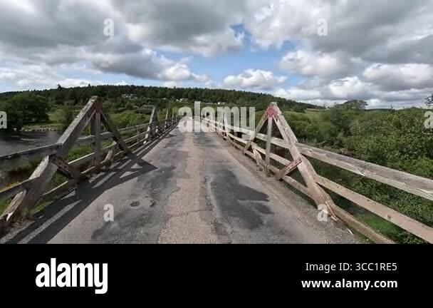 Wooden trestle bridge over River Spey near Nethy Bridge, featuring ...