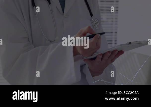 Medical doctor bringing pen to clipboard and writing patient notes ...
