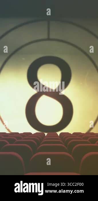 Animation of retro movie countdown in circle at empty cinema theater ...