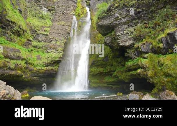 Discover the powerful upper section of Gluggafoss Waterfall, also known ...