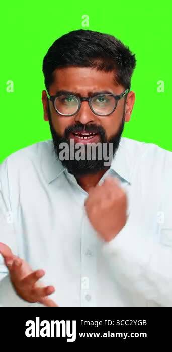 Indian man hits fist into open palm with decisive expression ...