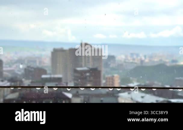 Raindrops on a drying line, falling raindrops in slow motion, raindrops ...