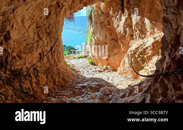 The breathtaking view from the entrance of the cave reveals stunning ...
