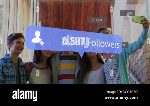 Group of five friends taking selfie initiating social media follower ...