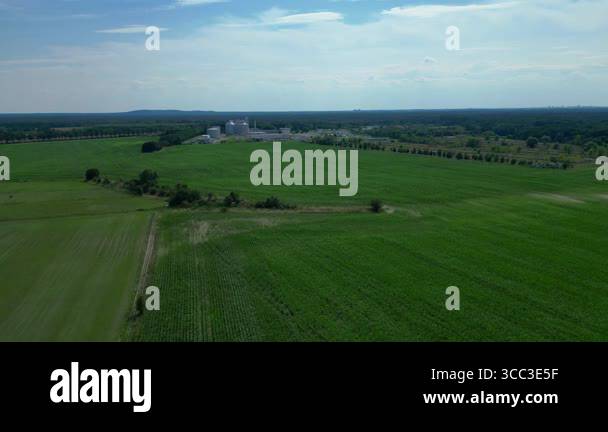 Wastewater treatment plant aerial view, demonstrating water purification process, ensuring ...