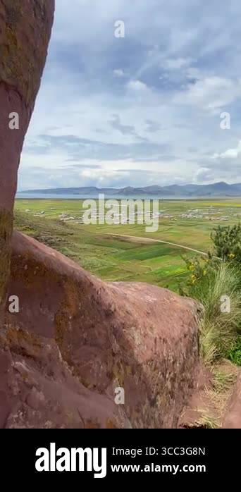 Reddish rock formations in Aramu Muru near Puno in Peru Stock Video ...