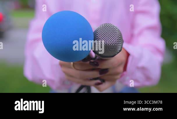PRESS - Young Female Journalist outdoor at news event writing notes and ...