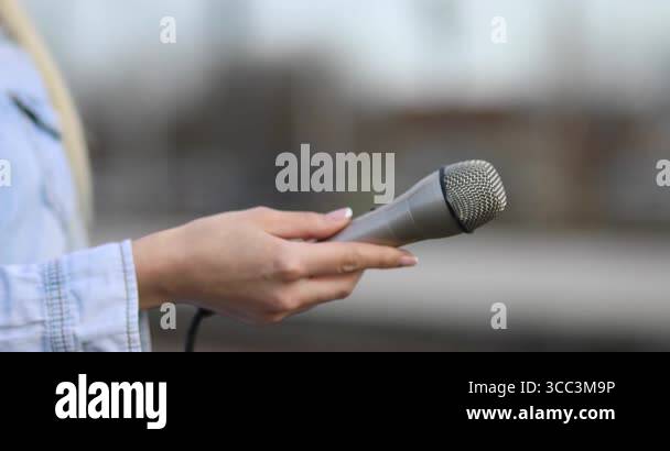 PRESS - Young Female Journalist outdoor at news event writing notes and ...