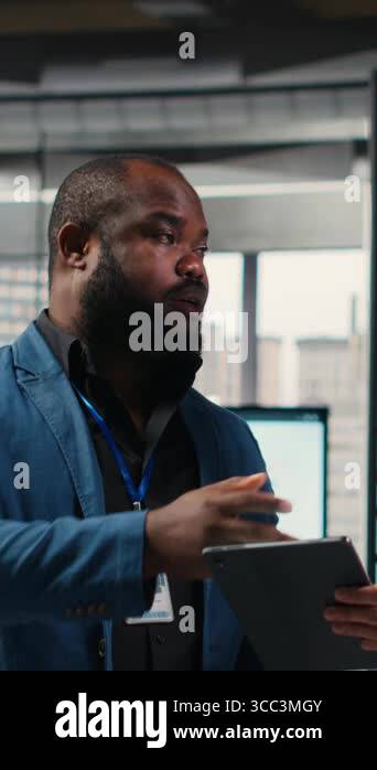 Vertical Video Businessmen analysts monitoring efficiency insights at ...