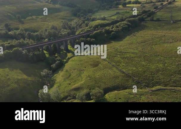 Drone footage showcases the historic Dent Head Viaduct, an iconic stone ...
