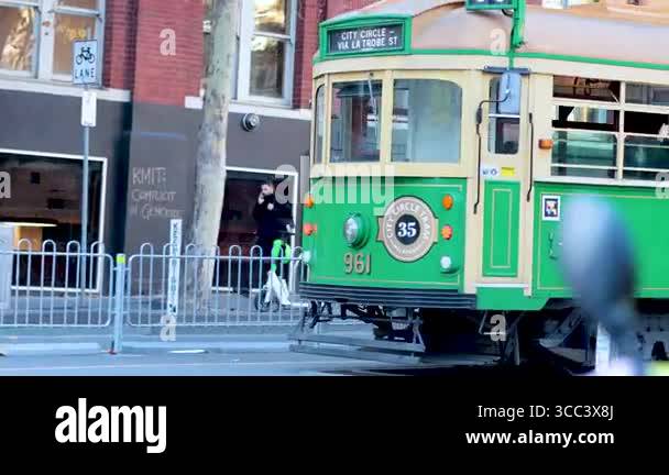 Two trams passing and people boarding Stock Video Footage - Alamy