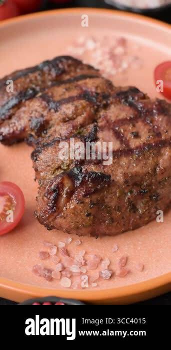 Meat, juicy beef steak grilled cooked to perfection for lunch ...