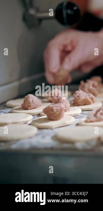 Semi-finished products. cooking. close-up. cook's hands lay out pieces ...