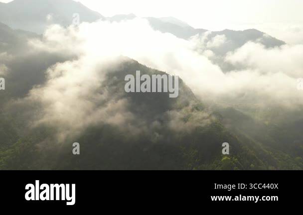 Aerial view of the high mountains and morning mist in the Nanxi River ...