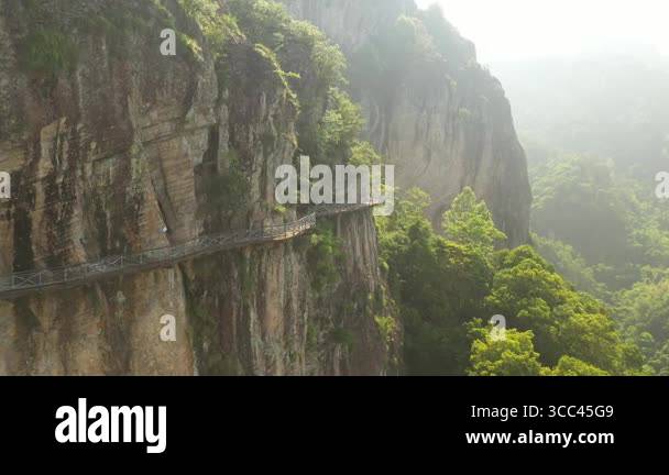 Aerial view of the high mountains and morning mist in the Nanxi River ...