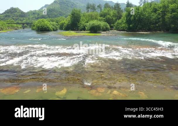 Aerial view of the high mountains and river in the Nanxi River tourist ...