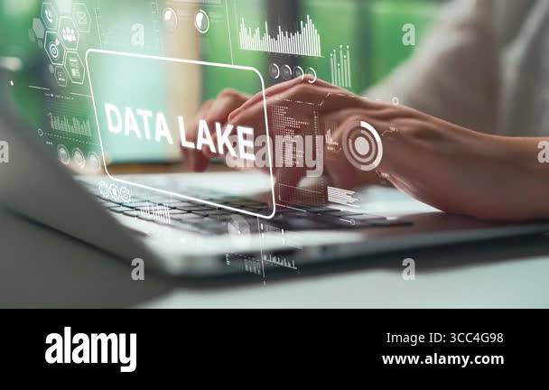 Person Working on Laptop with Data Lake Visualization and Analytics ...