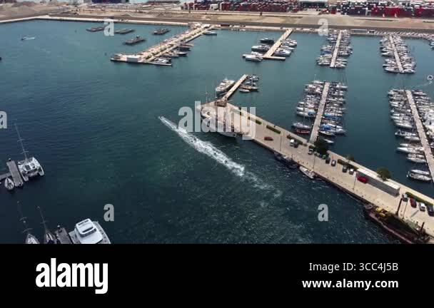 Aerial drone view of Marina Valencia with boats, yachts, and waterfront ...