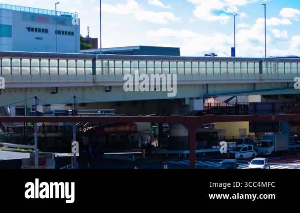 A timelapse of traffic jam at the city crossing in Tokyo daytime. High ...