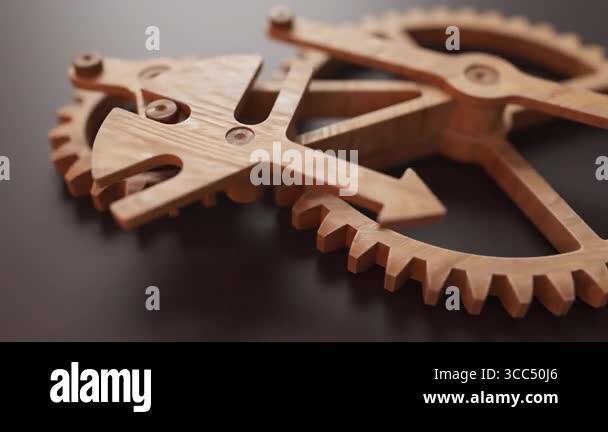Looping animation of a mechanical construction made of wooden gears ...
