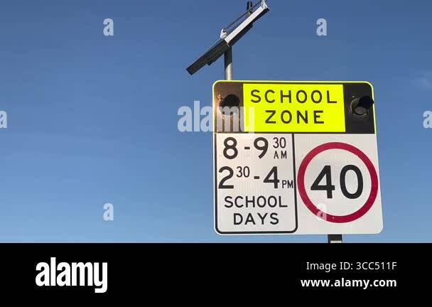 A solar powered school Zone traffic sign 40 km per hour speed ...