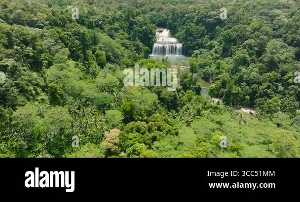 Waterfalls among the green mountain. Tinuy-an falls. Bislig, Surigao ...