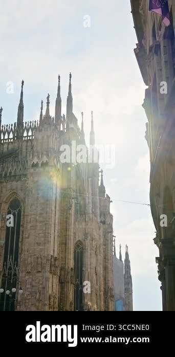 Milan, Italy - March 22, 2025: Side view of the Duomo Cathedral with ...