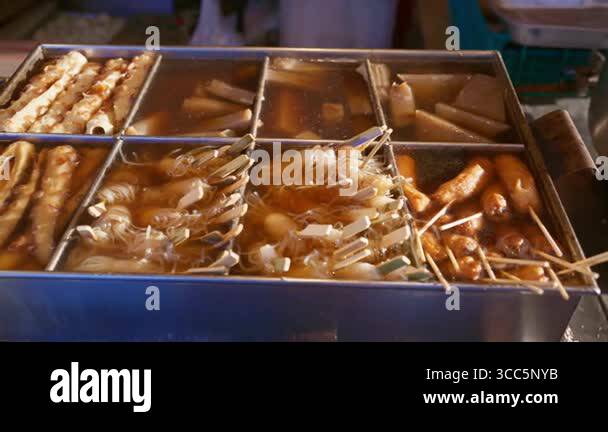 Close up of traditional Japanese oden stall at a street food market, in ...
