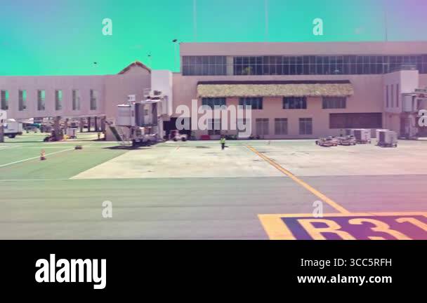 View from screen window as Delta and American Airlines planes stand by ...