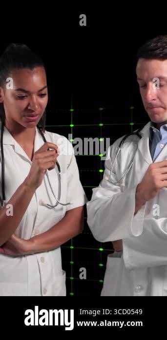 Animation of life line over two diverse doctors on black background ...