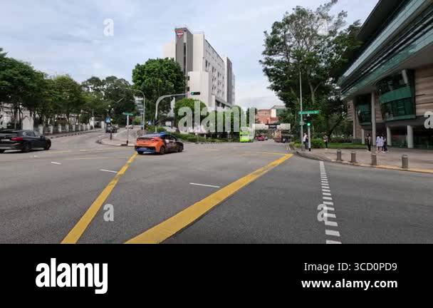 Vehicles crossing an intersection over time Stock Video Footage - Alamy