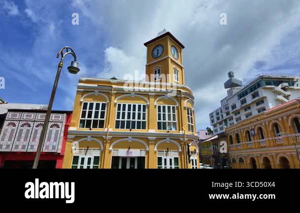 Yellow colonial building featuring tall clock tower Stock Video Footage ...