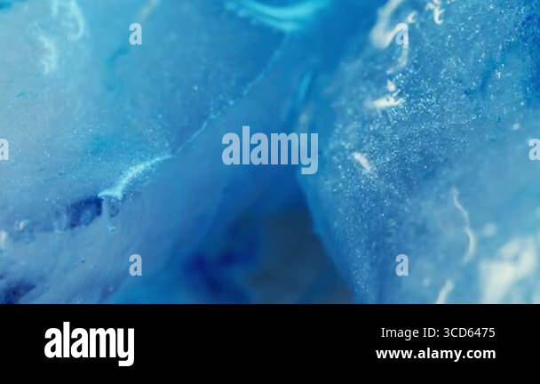 Light fluid. Sparkling ink. Defocused blue color ice water frost ...