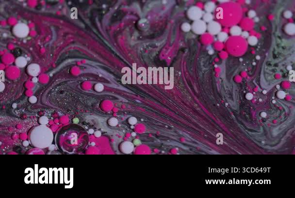 Spilling oil. Acrylic paint water. Blur pink white purple color ...